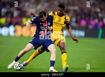 Inter Milan's Denzel Dumfries, left, in action during the Serie A ...