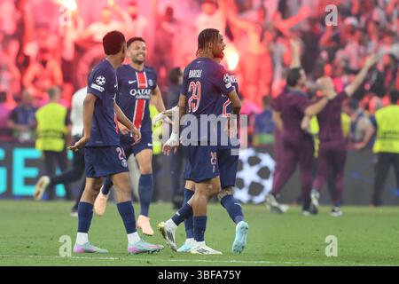 PSG players celebrate at the end of a Champions League opening phase ...