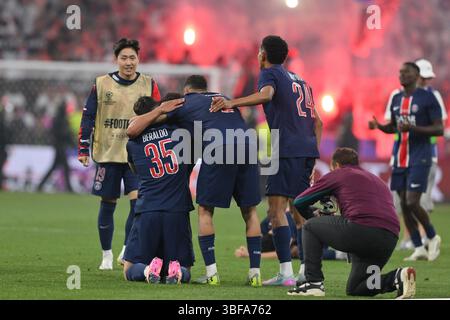 PSG players celebrate at the end of a Champions League opening phase ...