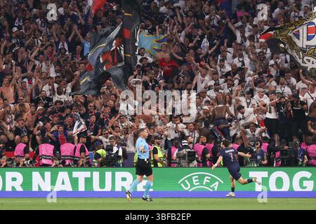PSG's Khvicha Kvaratskhelia celebrates after scoring his side's third ...