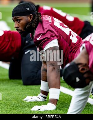 Washington Commanders defensive end Andre Jones Jr. (50) rushes during ...
