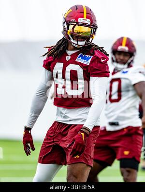 Washington Commanders safety Tyler Owens (18) rushes during an NFL ...
