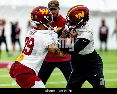 Washington Commanders wide receiver Lawrence Cager (89) celebrates in ...