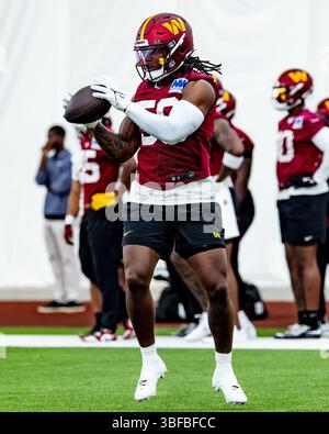 Washington Commanders linebacker Jordan Magee (58) during drills in the ...
