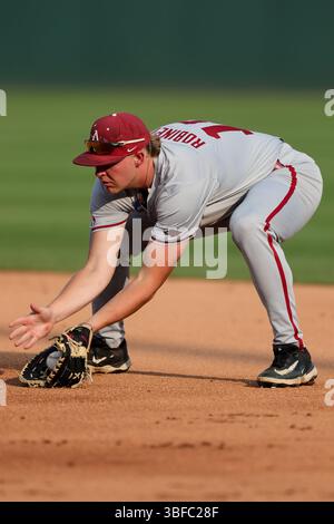 May 1, 2025: Razorback first baseman Reese Robinett (18) reaches out to ...