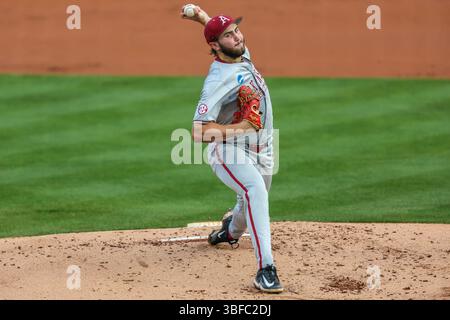 May 31, 2025: Zach Root (33) of Arkansas prepares to deliver the ball ...