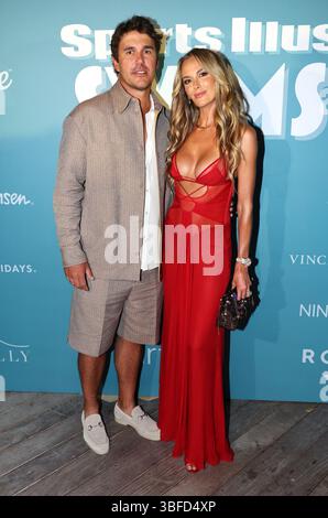 Brooks Koepka (L) and Jena Sims attend The 2019 ESPYS presented by ...