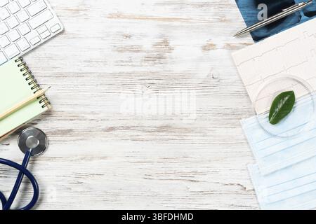 Doctors desktop with medical supplies. Computer keyboard, x-ray image ...