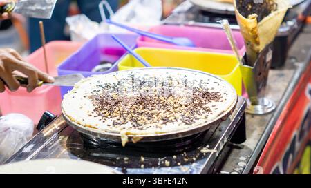 The process of making crispy crepes filled with various different ...