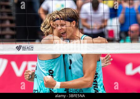 David Åhman, left, and Jonatan Hellvig of Sweden, with Tina Graudina ...