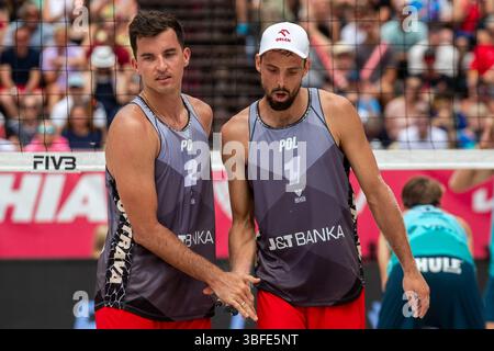 David Åhman, left, and Jonatan Hellvig of Sweden, with Tina Graudina ...