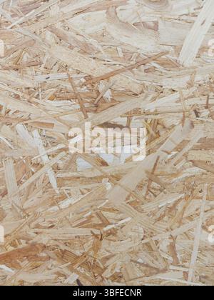 A close-up view of oriented strand board (OSB), showcasing its ...