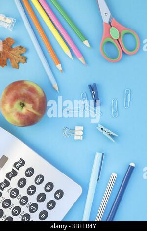 Frame from school and office supplies Paper clips, scissors, pens, felt ...