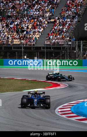 Williams driver Carlos Sainz of Spain steers his car during a ...