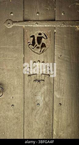 Traditional handmade wooden door in near plan Stock Photo - Alamy