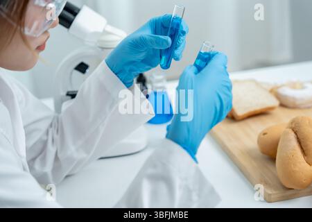 Scientist check chemical food residues in laboratory. Control experts ...