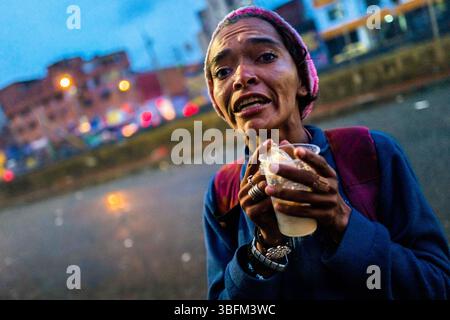 A Colombian drug user, intoxicated after smoking basuco – an unrefined ...