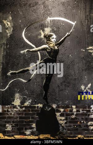 Graffiti by Banksy in a destroyed house in Gorenka, Ukraine Stock Photo ...