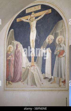 Fresco by Fra Angelico showing Saint Dominic kneeling before the crucified Christ. Located in ...