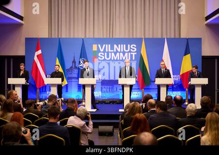 Romanian President Nicusor Dan, left, nominates Ilie Bolojan, the ...