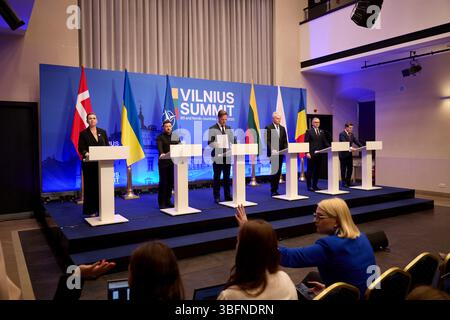 Romanian President Nicusor Dan, left, nominates Ilie Bolojan, the ...