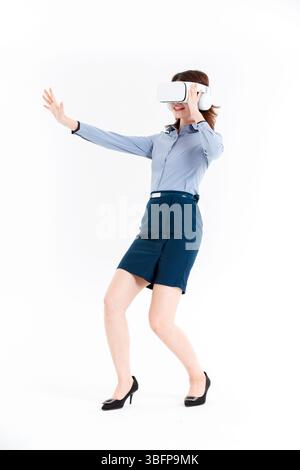 A young Chinese businesswoman with a VR headset Stock Photo - Alamy