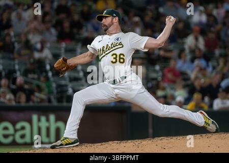 Athletics pitcher Hogan Harris (36) is pulled from the game after ...