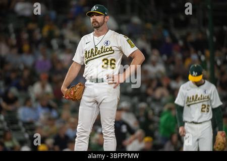 Athletics pitcher Hogan Harris (36) throws during the ninth inning of a ...