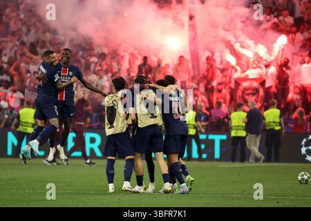 Paris Saint-Germain players celebrate with the trophy during the UEFA ...