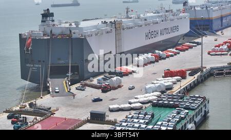SUZHOU, CHINA - JUNE 3, 2025 - A cargo ship load automobiles for export ...