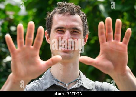 Sport climber Adam Ondra poses for a photographer in auditorium of ...