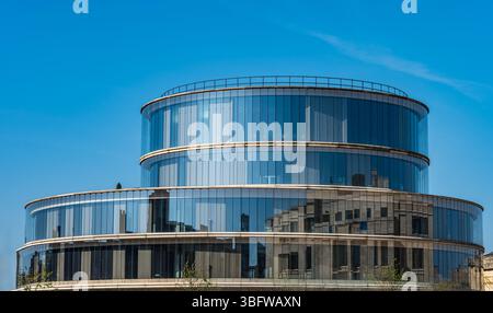 Modern round glass building of Blavatnik School of Government ...