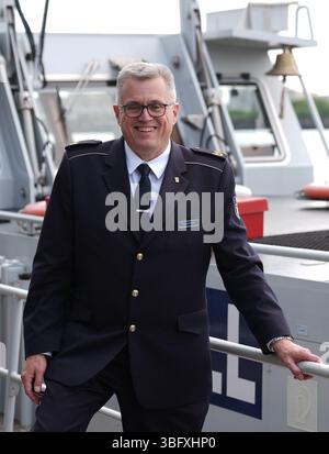 Hamburg, Germany. 03rd June, 2025. Customs officers stand on board a ...