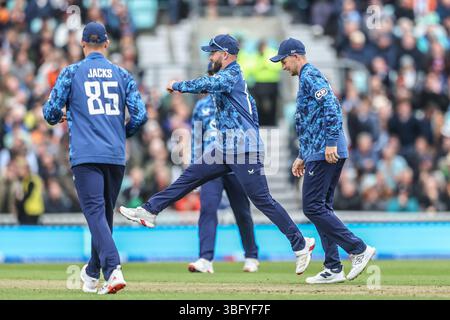 West Indies' Justin Greaves celebrates taking the wicket of Australia's ...