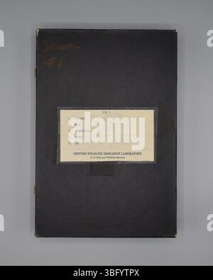 A box containing glass slides with animal hair samples from various ...