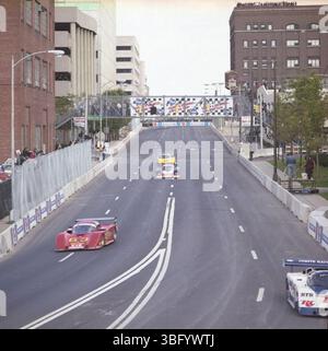 Images from the 1985 Columbus Ford Dealers 500 depict cars racing on ...