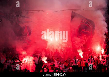 Paris Saint-Germain fans light flares to celebrate their equaliser from ...