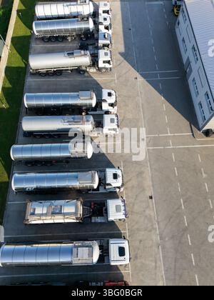 Fleet of trucks with tank trailers. Aerial view Stock Photo - Alamy
