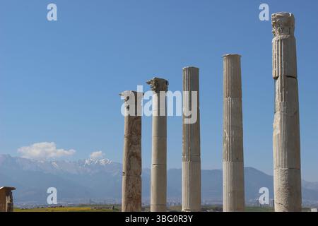 Snow capped mountains stand tall through haze in Bear River Migratory ...