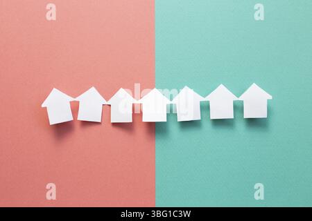 Cutout paper house on green grass and bright blurred background Stock ...
