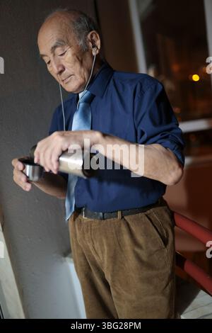 Its coffee break. Senior teacher drink coffee in restroom. Enjoying ...