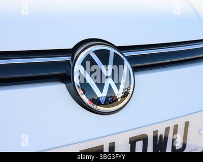 This image captures a close-up of the VW Golf badge on the exterior of ...