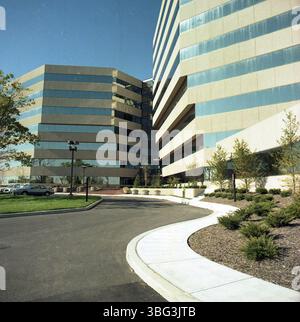 This photograph features the Metro Center V office building, captured ...