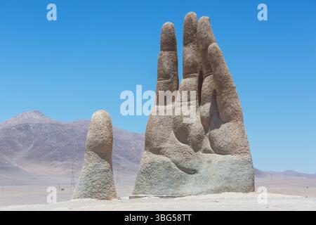 Hand sculpture in the Atacama desert in Northern Chile Stock Photo - Alamy