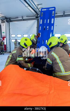 Scottish Fire and Rescue Service trainee firefighters during training ...