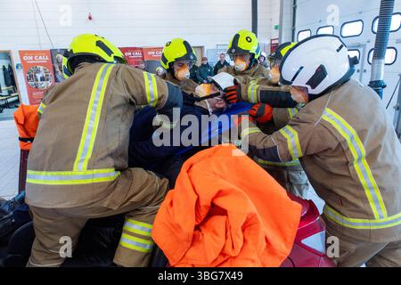 Scottish Fire and Rescue Service trainee firefighters during training ...