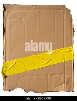 Yellow parcel tape label on cardboard Stock Photo - Alamy