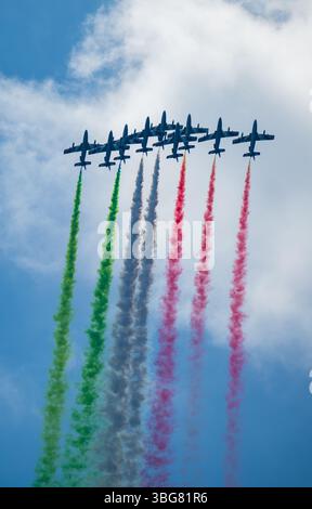 Frecce Tricolori perform aerial display with tricolor smoke over Italy ...