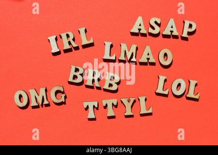 LMAO, acronym used in text speak in wooden alphabet letters isolated on ...