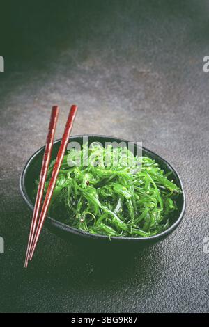 Chuka salad made from fresh seaweed, with sesame dressing, two bowls ...